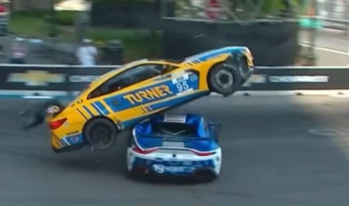 BMW M4 GT4 gets airborne, lands on top of Aston Martin